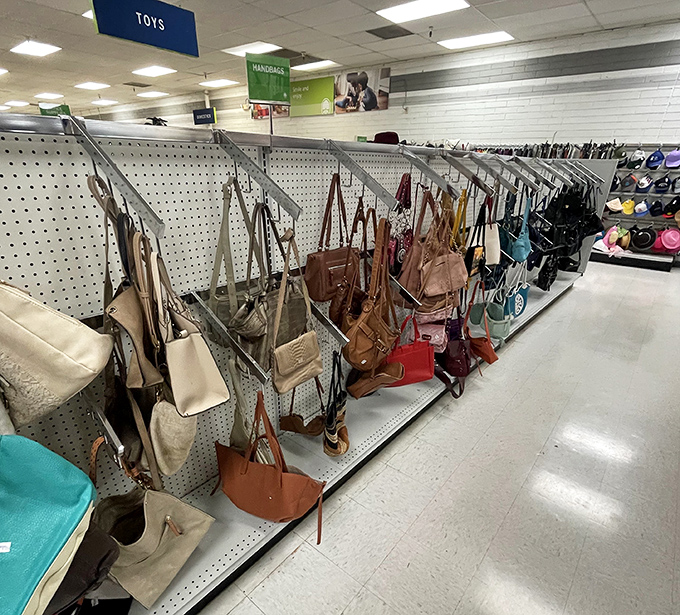 Handbag heaven for the budget-conscious fashionista—leather, canvas, and everything in between hanging like ripe fruit ready for picking.