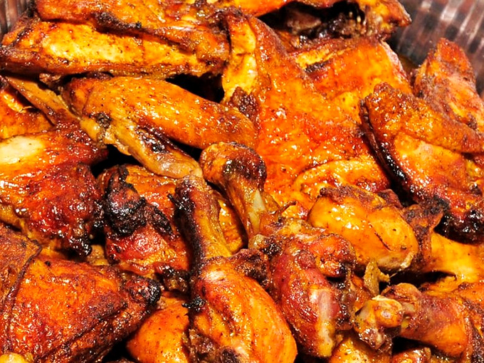 Baked chicken glowing with a sunset-hued spice rub that proves sometimes the simplest preparations deliver the most profound flavors.