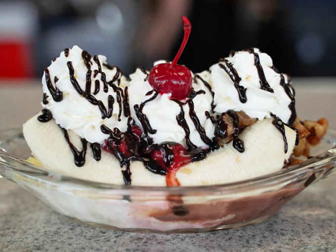 The banana split at Doumar's doesn't whisper, it announces itself—a glorious monument to the days when desserts weren't afraid to be desserts.