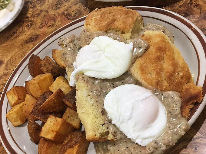 Biscuits swimming in gravy with perfectly poached eggs standing sentinel. The breakfast that launched a thousand naps.