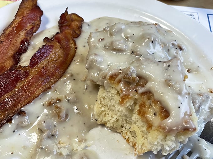 Biscuits and gravy: where Southern comfort food meets Maine hospitality in a pool of peppery, savory bliss.