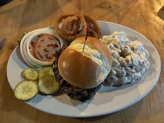 Potato salad that didn't come from a plastic tub, onion rings with actual onion flavor, and a burger that makes you question why you ever eat anything else.