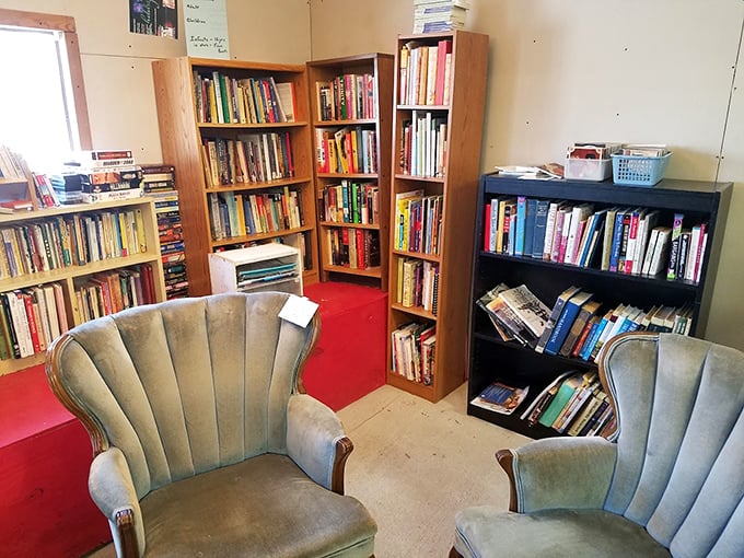 The bookworm's retreat, complete with vintage armchairs perfect for test-driving your next literary adventure.