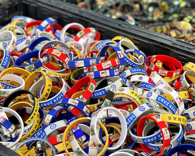 A kaleidoscope of Cruz Azul bracelets! Like a wearable fiesta, these colorful bands are tiny ambassadors of team spirit and cultural pride.