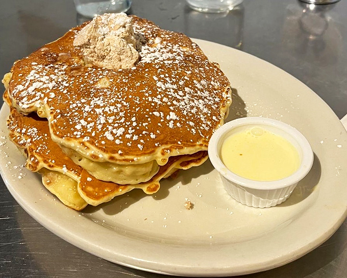 The famous bread pudding pancakes&mdash;where breakfast and dessert have a beautiful love child. That cinnamon butter is the cherry on top.