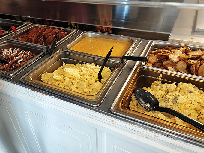 The breakfast buffet in all its glory&mdash;where scrambled eggs, bacon, and hash browns form the holy trinity of morning happiness.