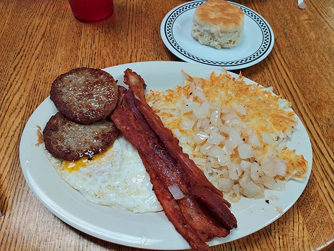 The classic American breakfast trifecta: eggs, meat, and hash browns. The holy trinity of morning happiness that never disappoints.