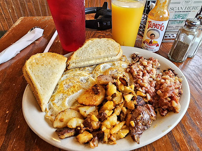 The breakfast plate that answers all of life's important questions. Eggs, homefries, and toast &ndash; the holy trinity of morning satisfaction.