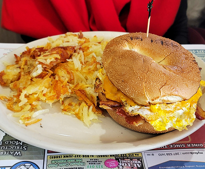 Breakfast sandwiches that make morning people out of night owls, served with crispy hash browns.