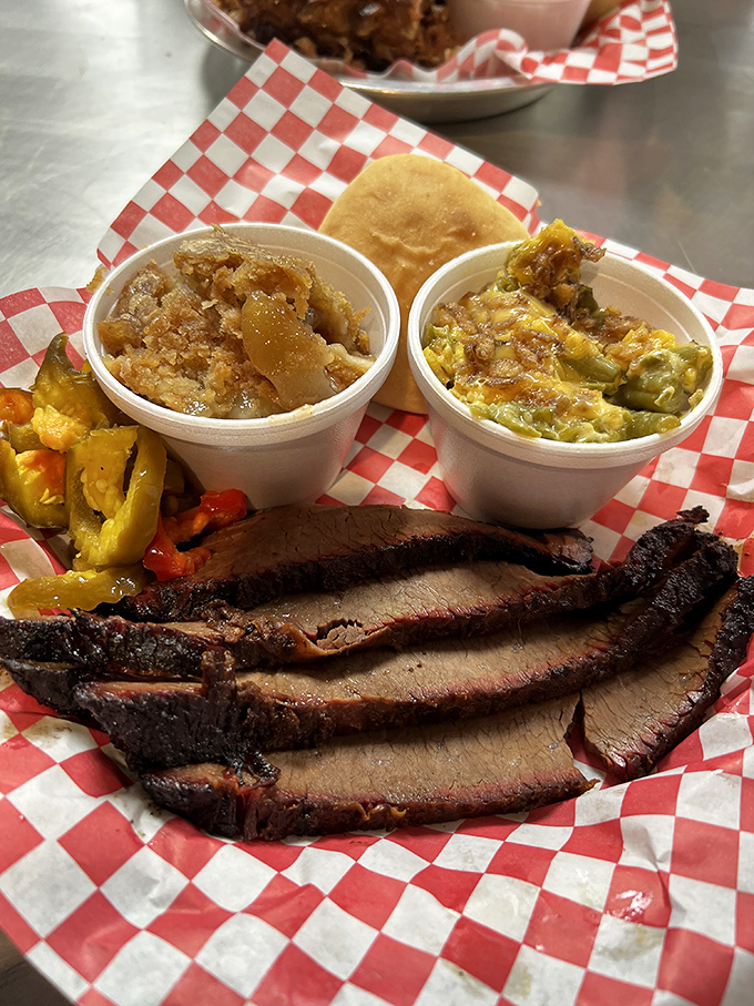 Brisket sliced thick enough to matter, with a smoke ring that would make any pitmaster proud.