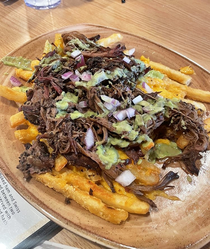 Loaded fries: where the phrase "I'll just have a few" goes to die a delicious, avocado-smothered death.