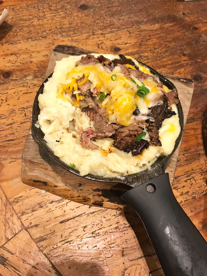 This isn't just brisket on mashed potatoes&mdash;it's comfort food architecture, building a monument to what happens when smoke meets patience.