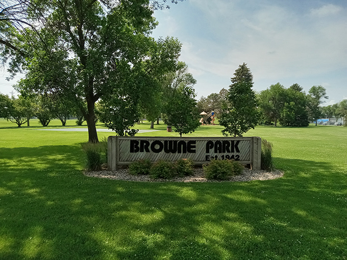 Browne Park's welcoming sign promises green respite from daily stresses, no appointment or smartphone required.