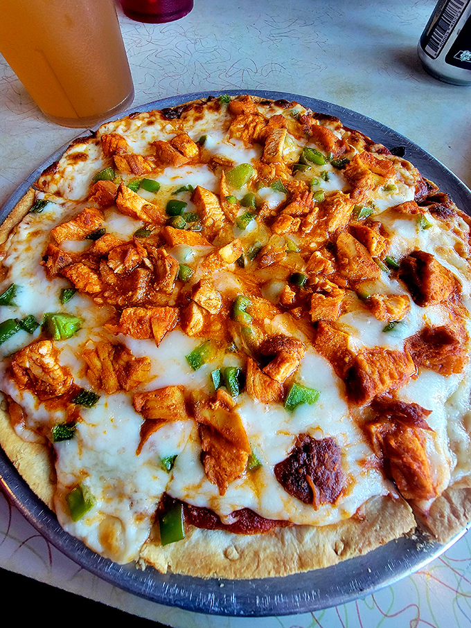 Pizza for breakfast? Breakfast on pizza? The Arcade blurs the lines deliciously with this cheese-blanketed masterpiece topped with colorful peppers.