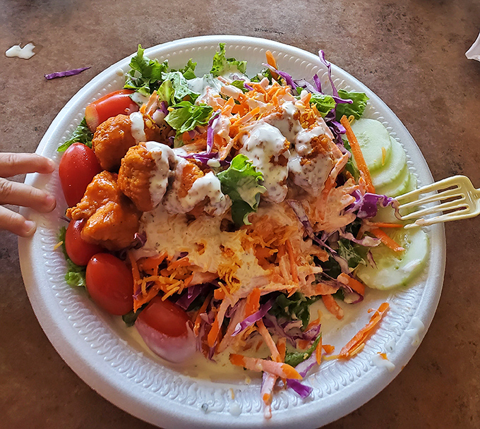 The legendary Buffalo Chicken Salad&mdash;where "eating healthy" and "absolute pleasure" aren't mutually exclusive concepts. Those vibrant veggies are just showing off.