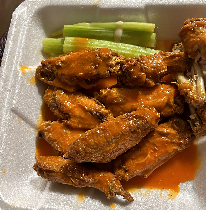 These buffalo wings aren't messing around. Slicked with sauce and ready for action, they're the supporting actors that steal the show.