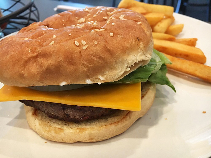 A classic burger with melted cheese and crispy fries shows this place handles lunch as expertly as breakfast.