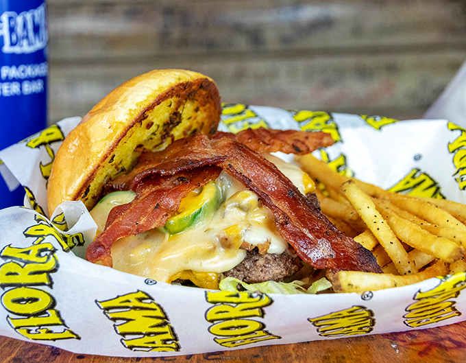 The burger that launched a thousand road trips, complete with bacon that doesn't whisper but announces itself with crispy, salty authority.