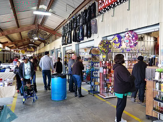 Weekend warriors navigate the concrete runway of deals. The serious expressions reveal the competitive sport that is Jockey Lot shopping.