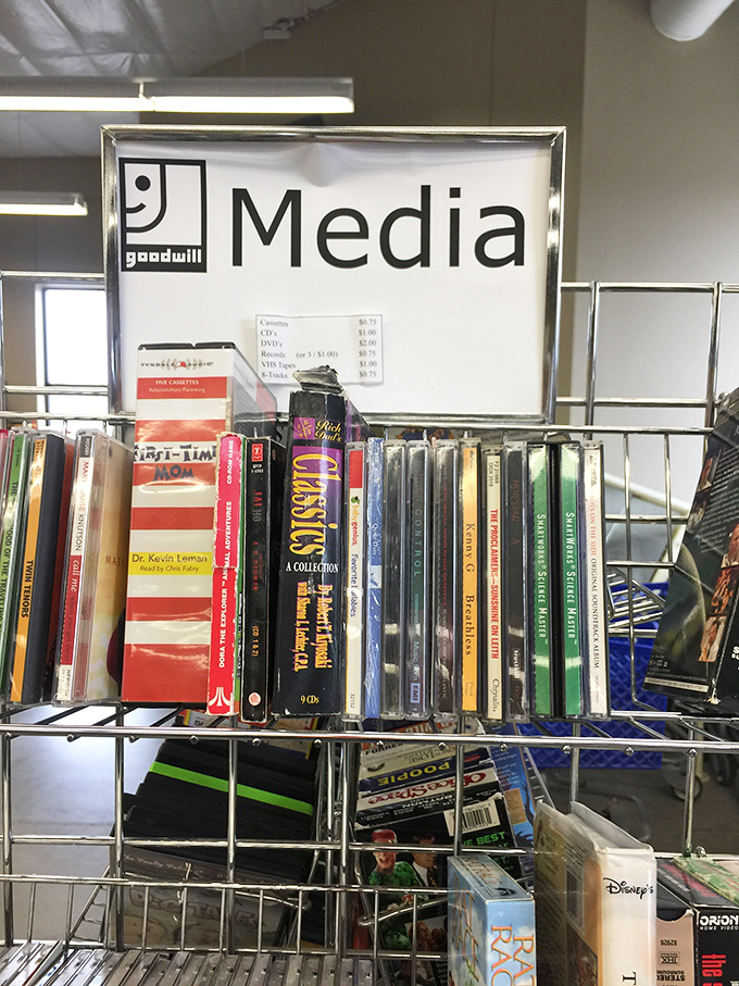 The media section: where forgotten CDs and DVDs await their second act. One person's discarded "Classics Collection" becomes another's musical rediscovery.