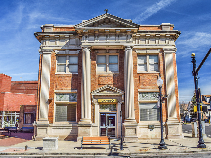 The former bank building now housing CHASE maintains its grandeur, as if your checking account deserves nothing less than Corinthian columns.