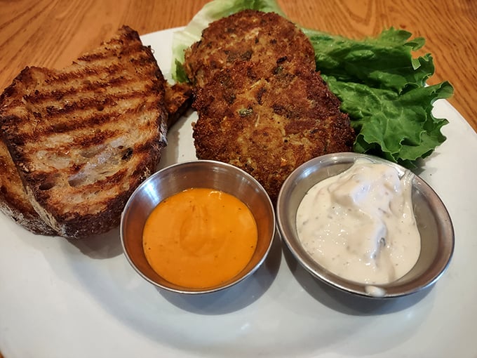 These crab cakes aren't playing around—golden-brown perfection with dipping sauces that make you wonder why you'd ever order anything else.