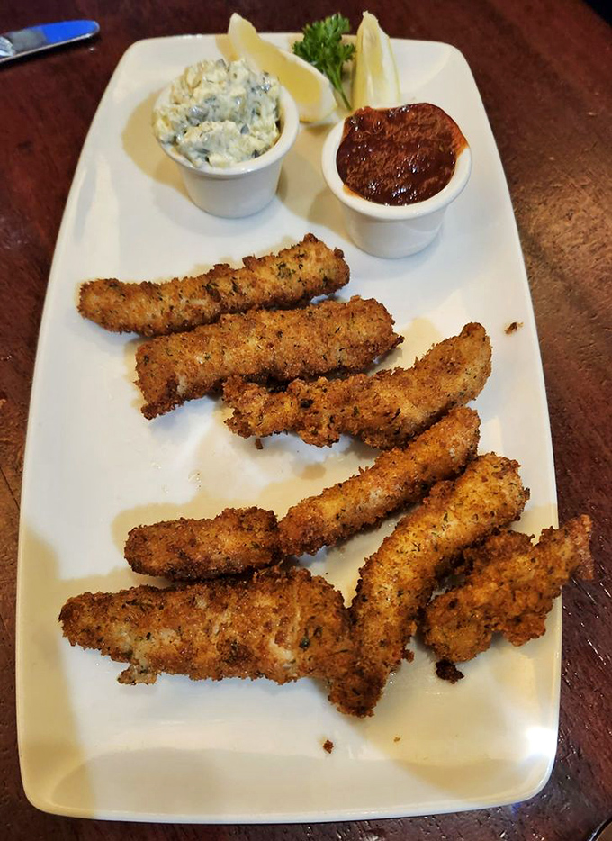 These golden-brown calamari strips aren't just appetizers&mdash;they're crunchy vehicles delivering seafood perfection straight to your happiness center.