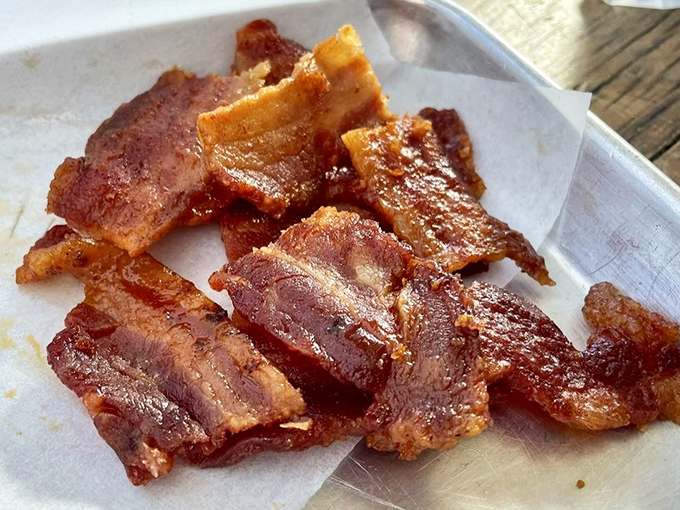 Candied bacon: because regular bacon wasn't already perfect enough. These glistening morsels are what would happen if bacon went to finishing school.