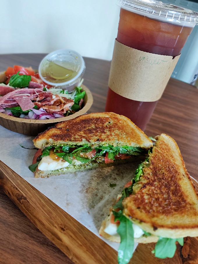 This sandwich isn't just stacked&mdash;it's architecturally sound. The perfect balance of crispy bread, fresh greens, and savory fillings.