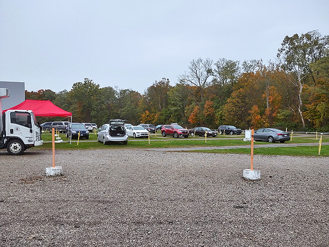 Fall colors provide a stunning backdrop for movie night. Even in autumn, the drive-in experience remains an irresistible tradition.