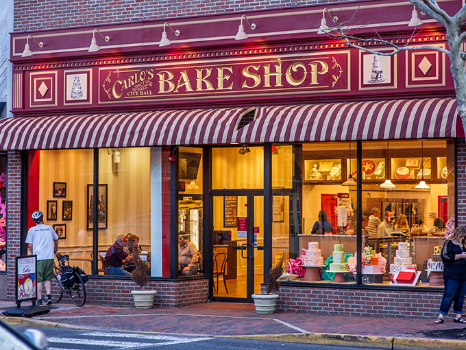 Carlo's Bake Shop's window displays are edible art that would make Michelangelo trade his chisel for a pastry bag. Sweet temptations that demand a closer look.