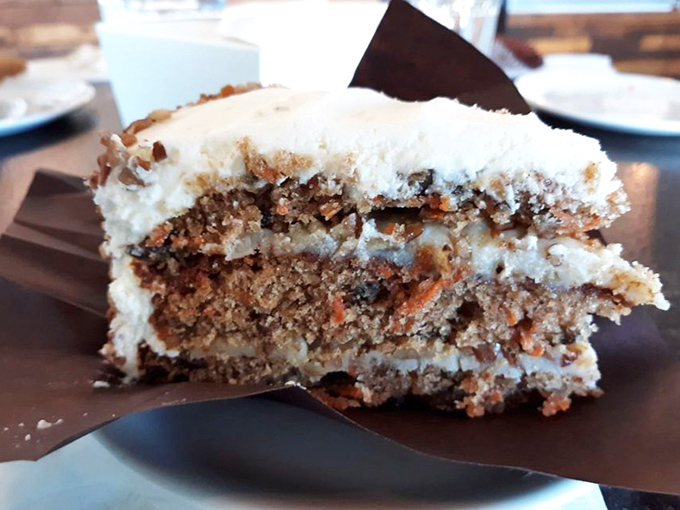 This slice of carrot cake isn't just dessert, it's an engineering marvel of moist layers, cream cheese frosting, and the illusion of vegetable nutrition.