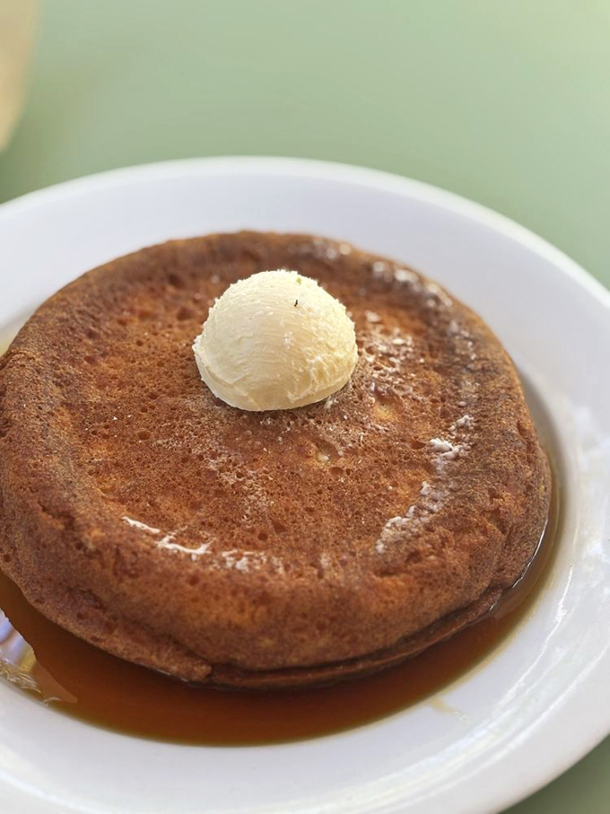 The cast iron pancake that launched a thousand return visits. That perfect dome with melting butter is basically breakfast royalty.