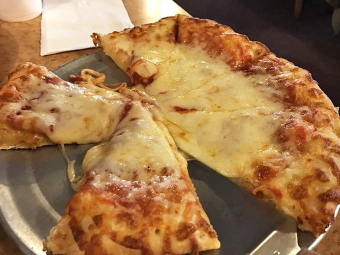 Sometimes simplicity is the verdict. This cheese pizza proves you don't need fancy toppings to create a masterpiece worthy of parole.