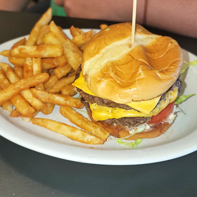 A burger that requires both hands and several napkins&mdash;the universal sign of something worth every delicious, messy bite.