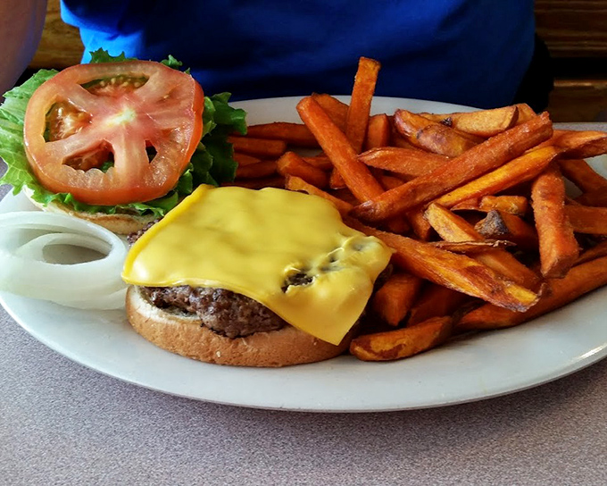 A cheeseburger so perfectly melted it should probably come with a warning label about excessive drooling while driving.