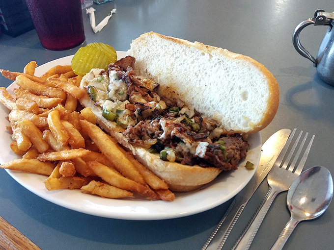 The cheesesteak that doesn't need Philadelphia's permission. Served with fries so golden they deserve their own currency.