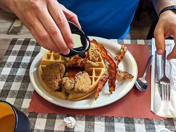 Chicken and waffles with bacon&mdash;the breakfast equivalent of hitting the jackpot. Sweet meets savory in a dance that makes taste buds applaud.