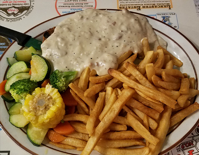 When gravy isn't just a condiment but a lifestyle choice. This chicken fried steak with fries and veggies is the Antelope Valley on a plate.