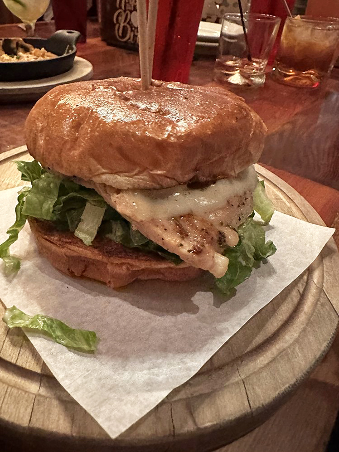 A sandwich that requires both hands and your full attention. This chicken creation demands respect—and plenty of napkins.