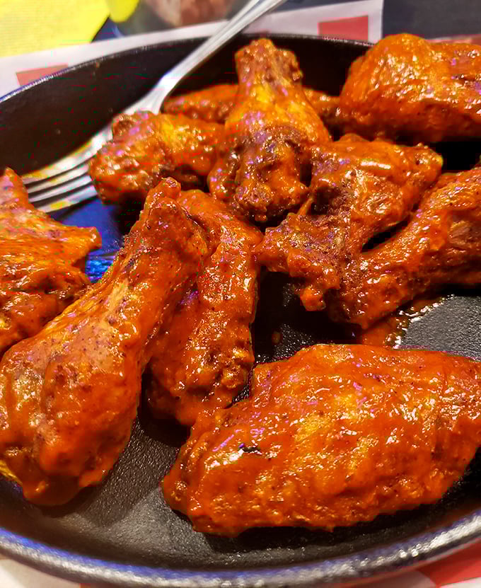 These wings aren't just coated in sauce&mdash;they're baptized in it. The kind of messy perfection that justifies the stack of napkins you'll need.