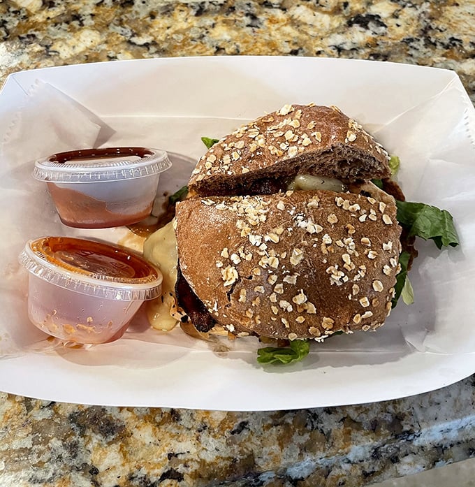 A burger joint that respects the bun &ndash; notice that perfect golden dome, those artisanal seeds, and the structural integrity that contains the magic within.
