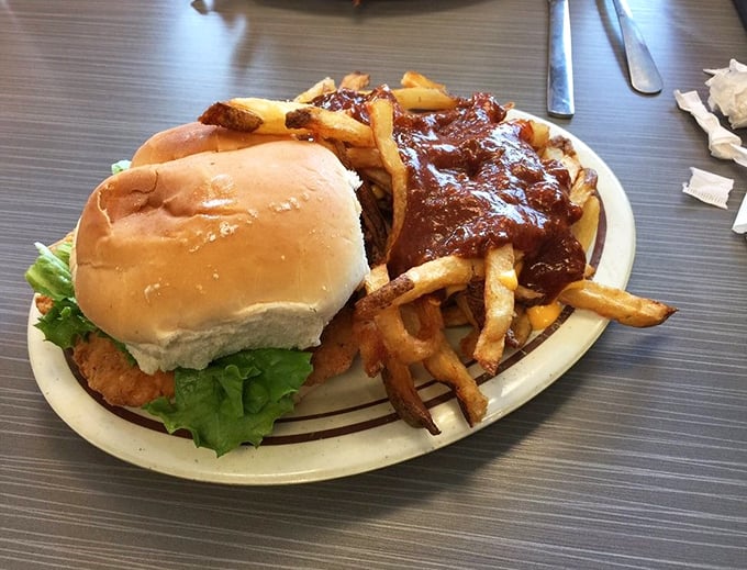 The chicken sandwich with chili-topped fries&mdash;proof that sometimes the best things in life come on a simple white plate with brown rings.