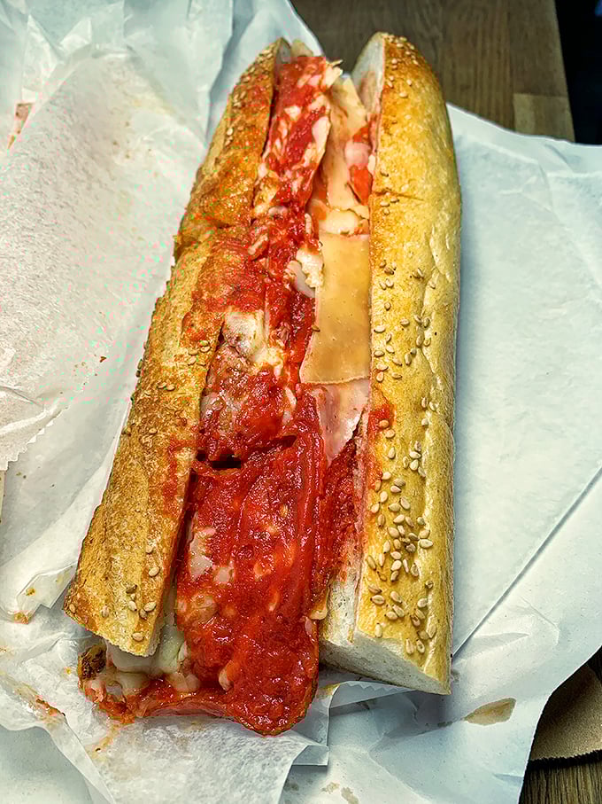 A sandwich that makes tomato sauce an art form. The seeded roll contains what could easily be classified as a religious experience.