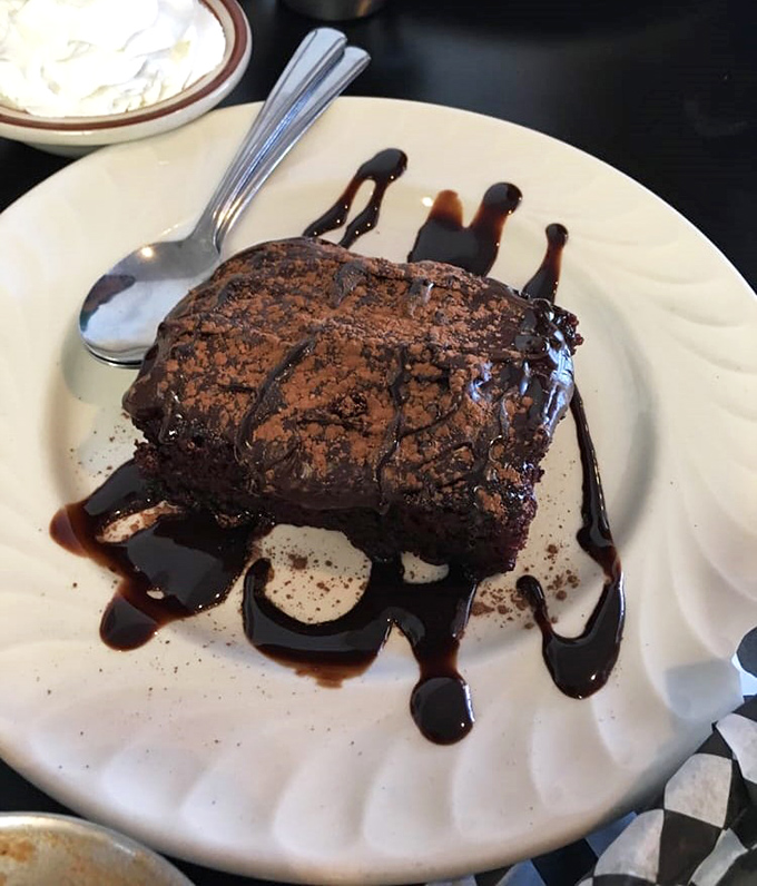 This chocolate cake drizzled with sauce looks like it could make a grown adult cry tears of pure joy.