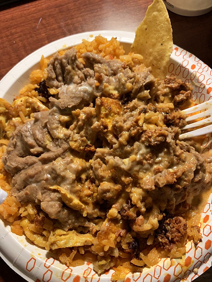 This mountain of rice, meat, and queso might not be what your doctor ordered, but it's definitely what your soul needs. Comfort food, Mexican-style. 