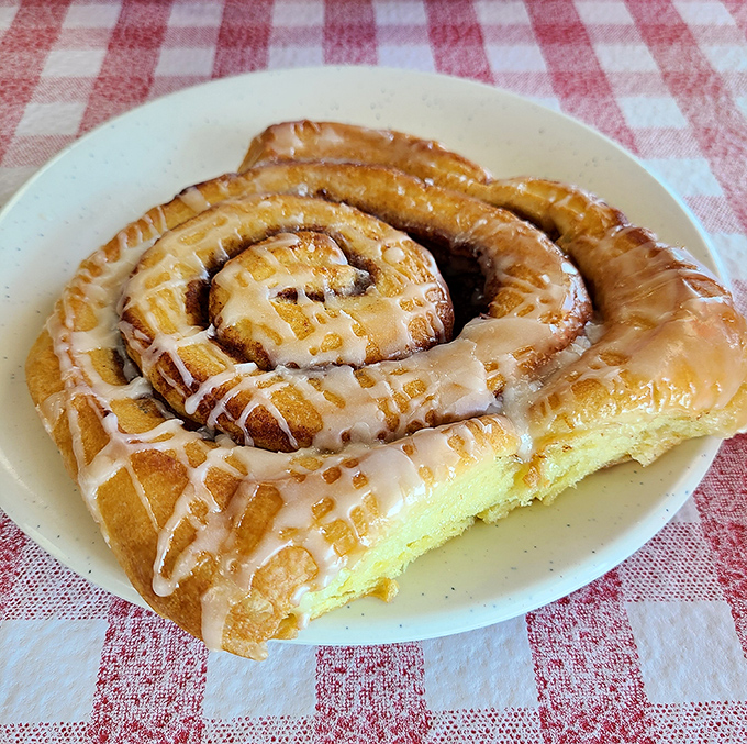 That cinnamon roll isn't playing around&mdash;it's what would happen if comfort and indulgence had a delicious, spiral-shaped baby.