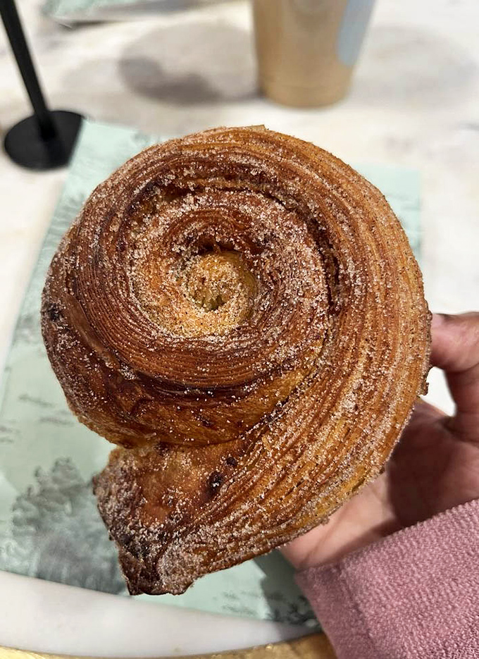 The morning bun that's worth setting your alarm for. Cinnamon-sugar spirals that could hypnotize you into ordering seconds before you've finished your first.
