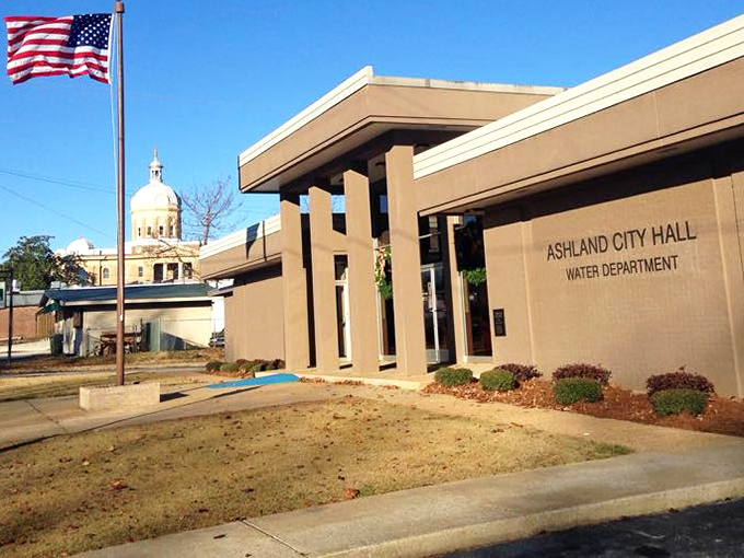 The City Hall stands proudly with the courthouse dome peeking behind it, like architectural cousins at a family reunion.