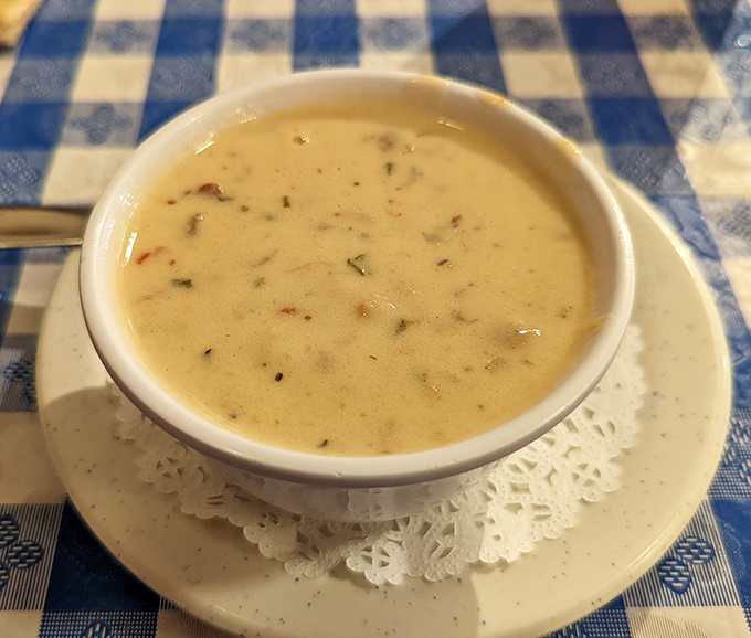 This isn't just clam chowder; it's a creamy bowl of maritime magic that would make a New Englander weep with joy.
